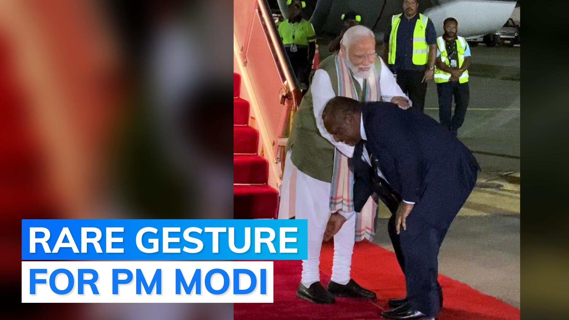 Papua New Guinea‘s PM touches Modi’s feet during ceremonial welcome | Watch | Editorji
