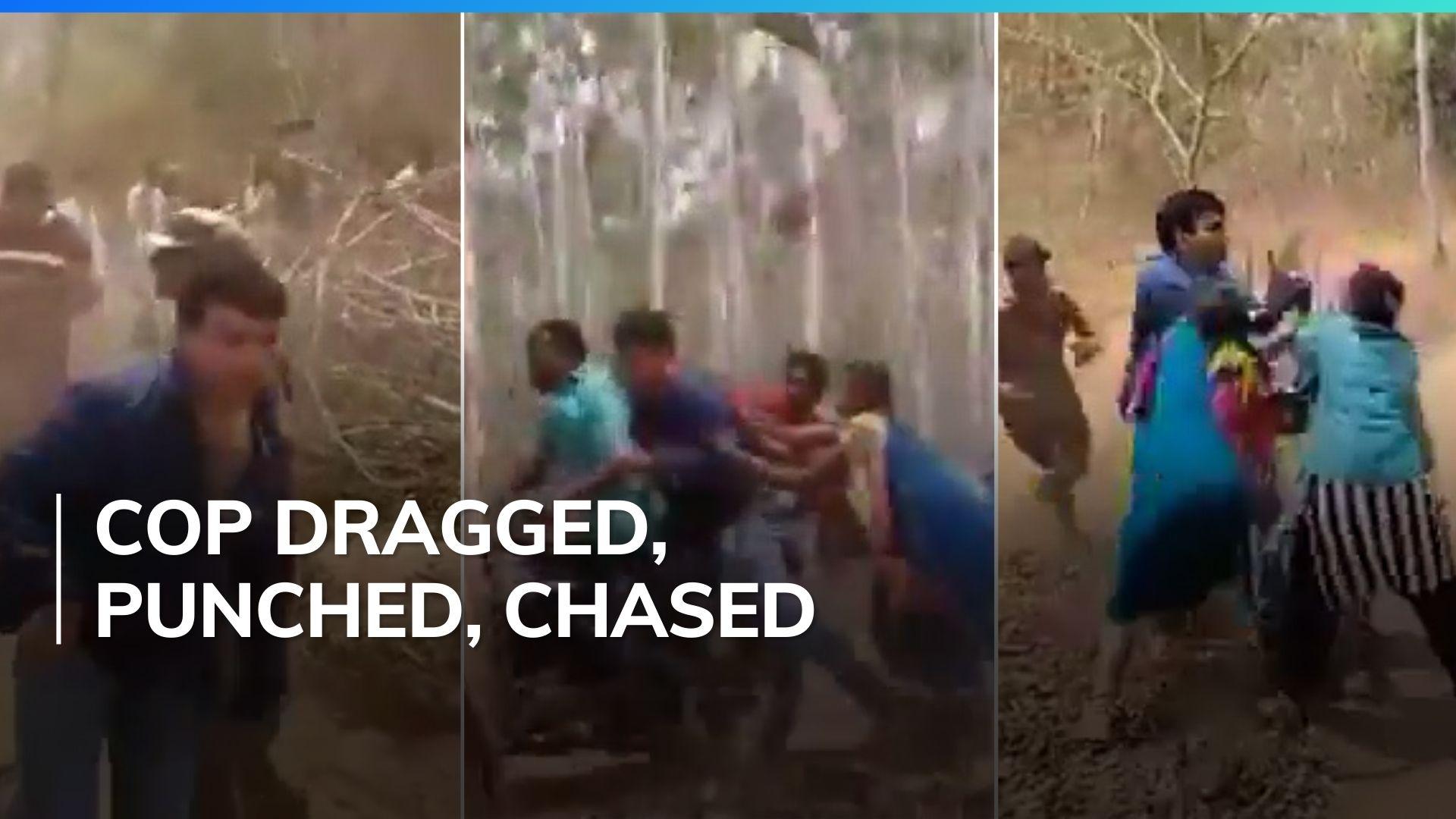 Tribals chase, punch, drag cop in Telangana | Watch | Editorji