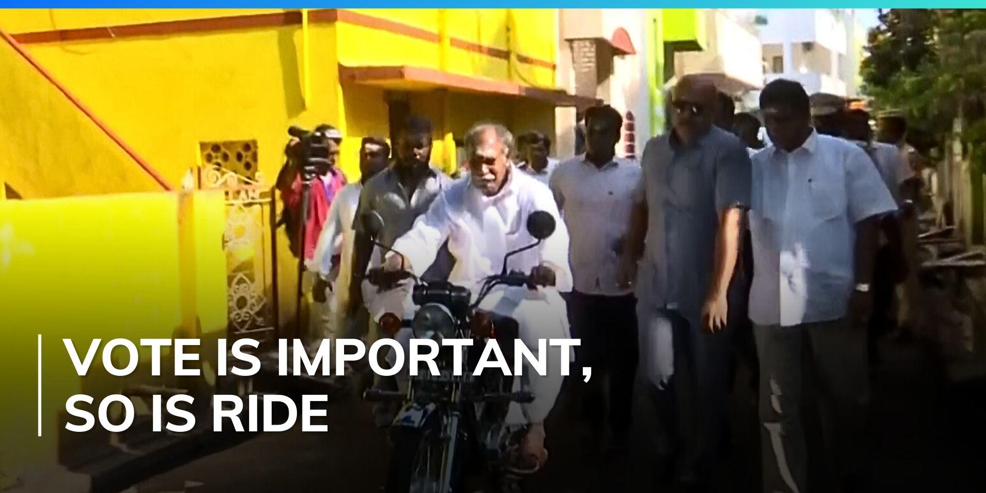 Puducherry CM N Rangasamy arrives on bike to cast his vote | Watch ...