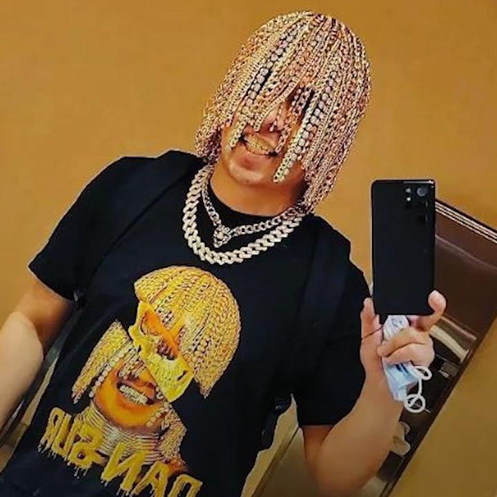 Mexican rapper gets gold chain hooks implanted into scalp, goes viral ...