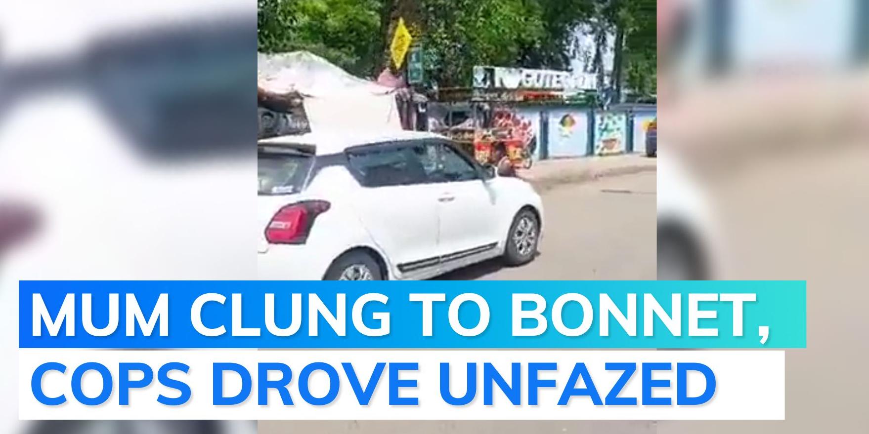 On cam: Woman jumps on car bonnet to prevent son’s arrest | Editorji
